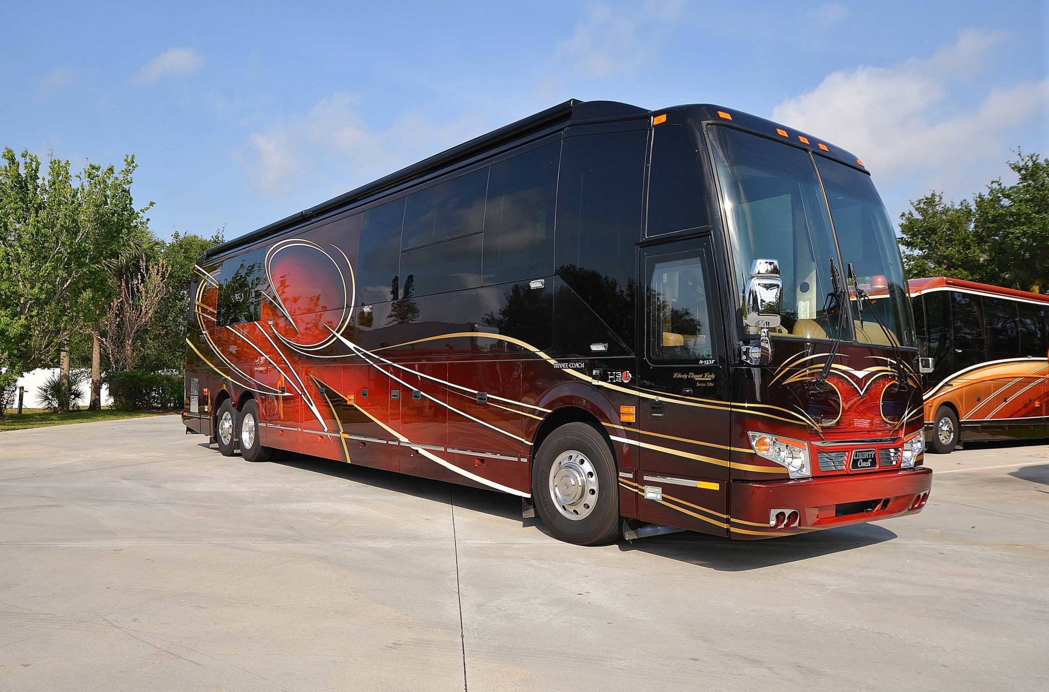 2016-Liberty-Coach-5335-Ext-Overview - Custom Luxury Motorcoach