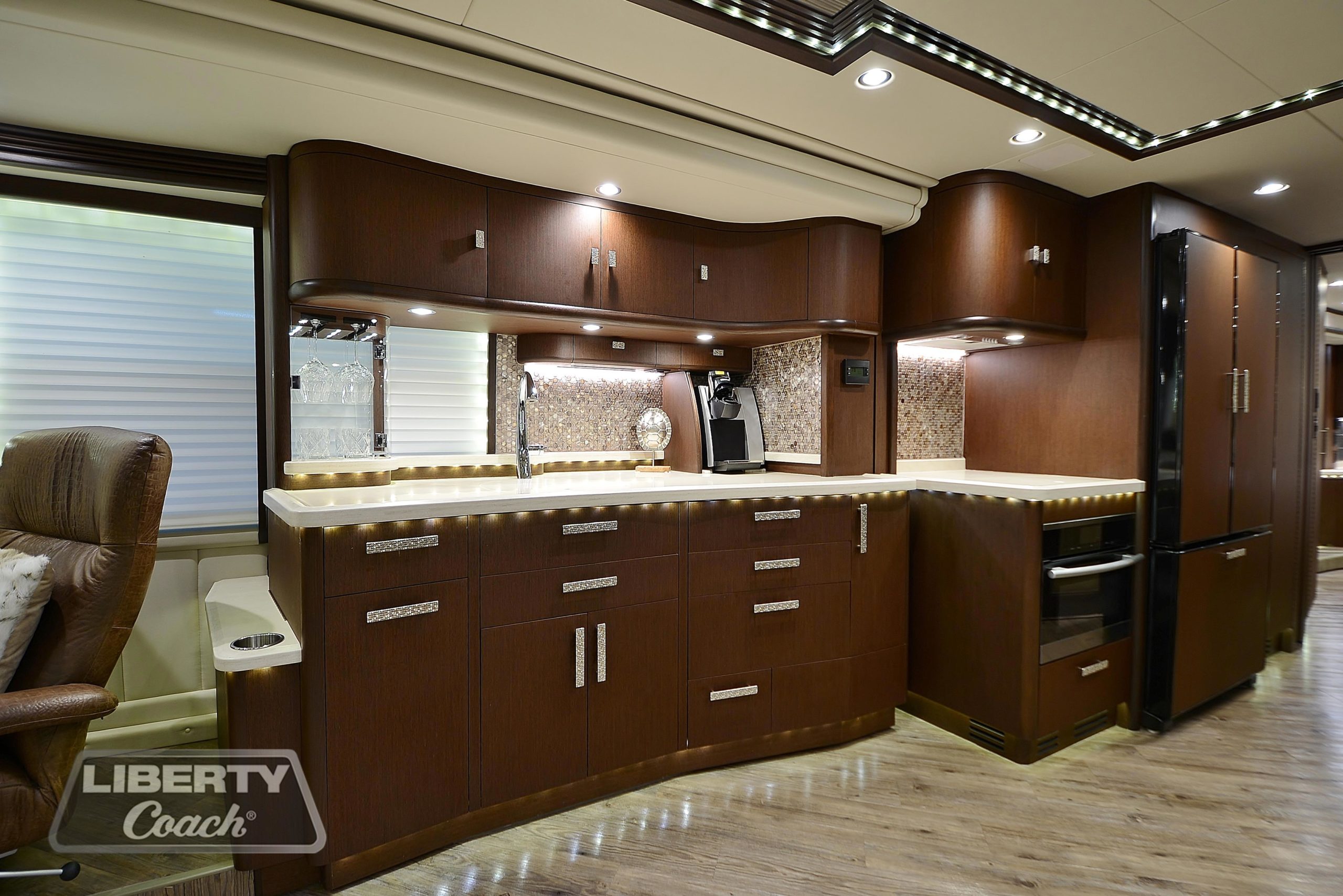 Liberty-Coach-5382-Dining-Overview - Custom Luxury Motorcoach