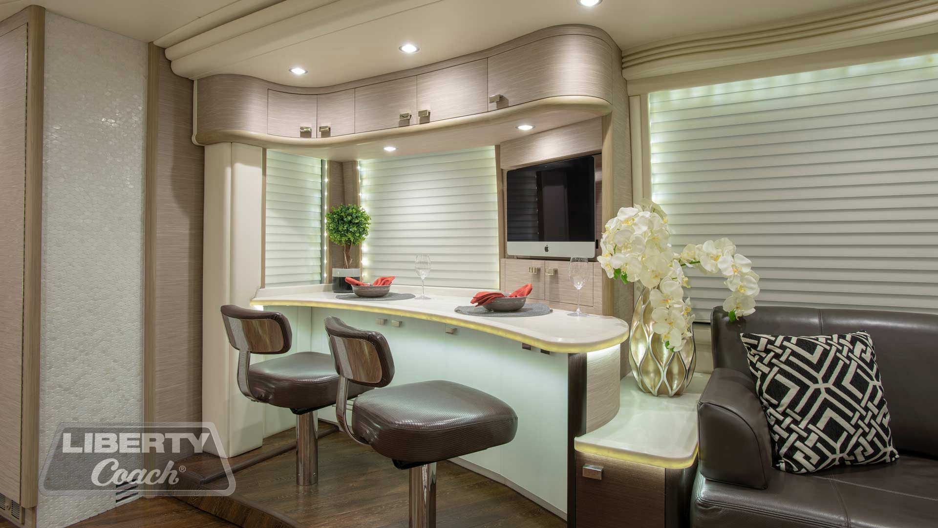 Liberty-Coach-7203-A-Dining-1-Gallery - Custom Luxury Motorcoach
