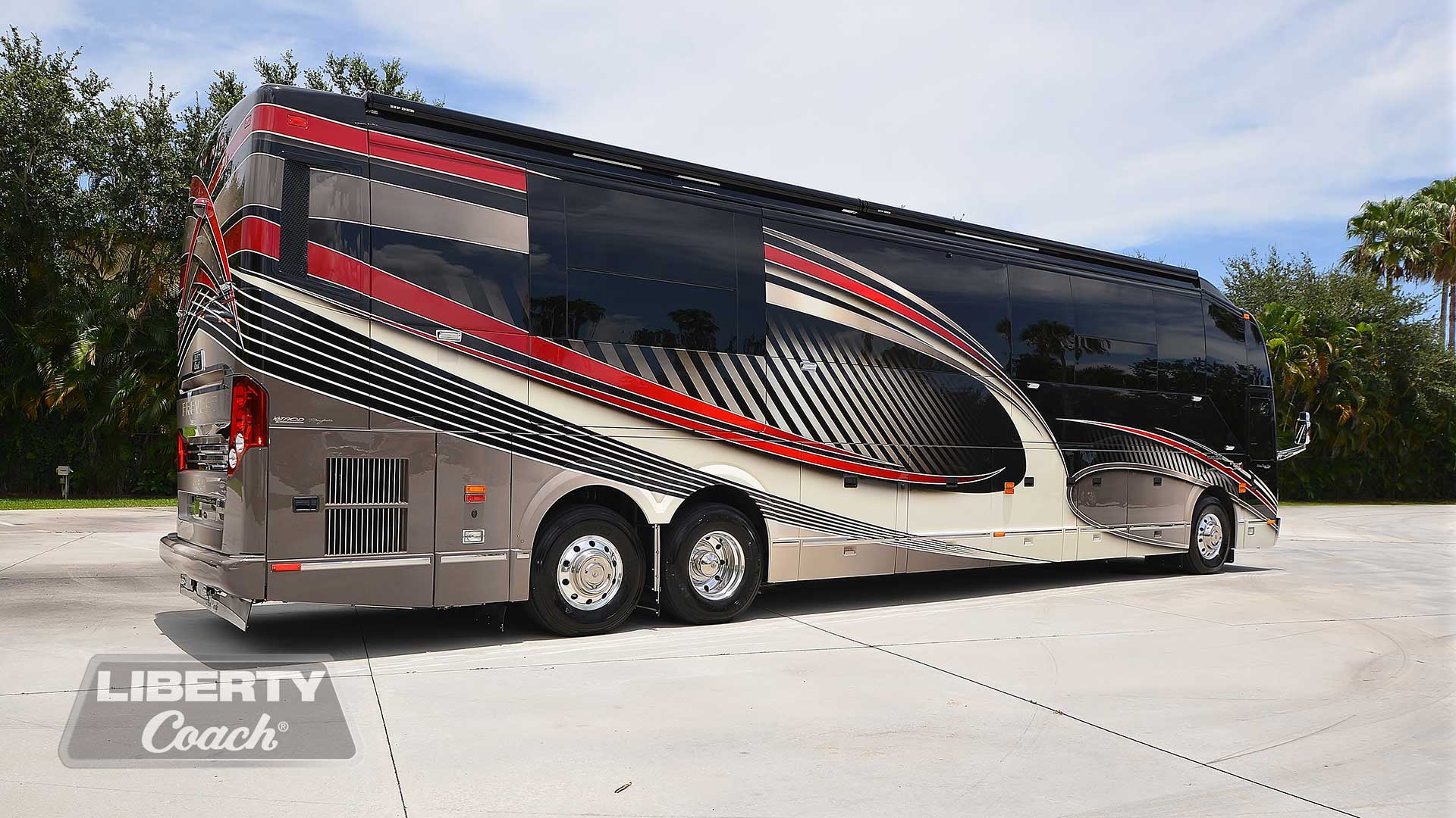 Liberty-Coach-5445-Entry-Side-Rear-View-Gallery - Custom Luxury Motorcoach