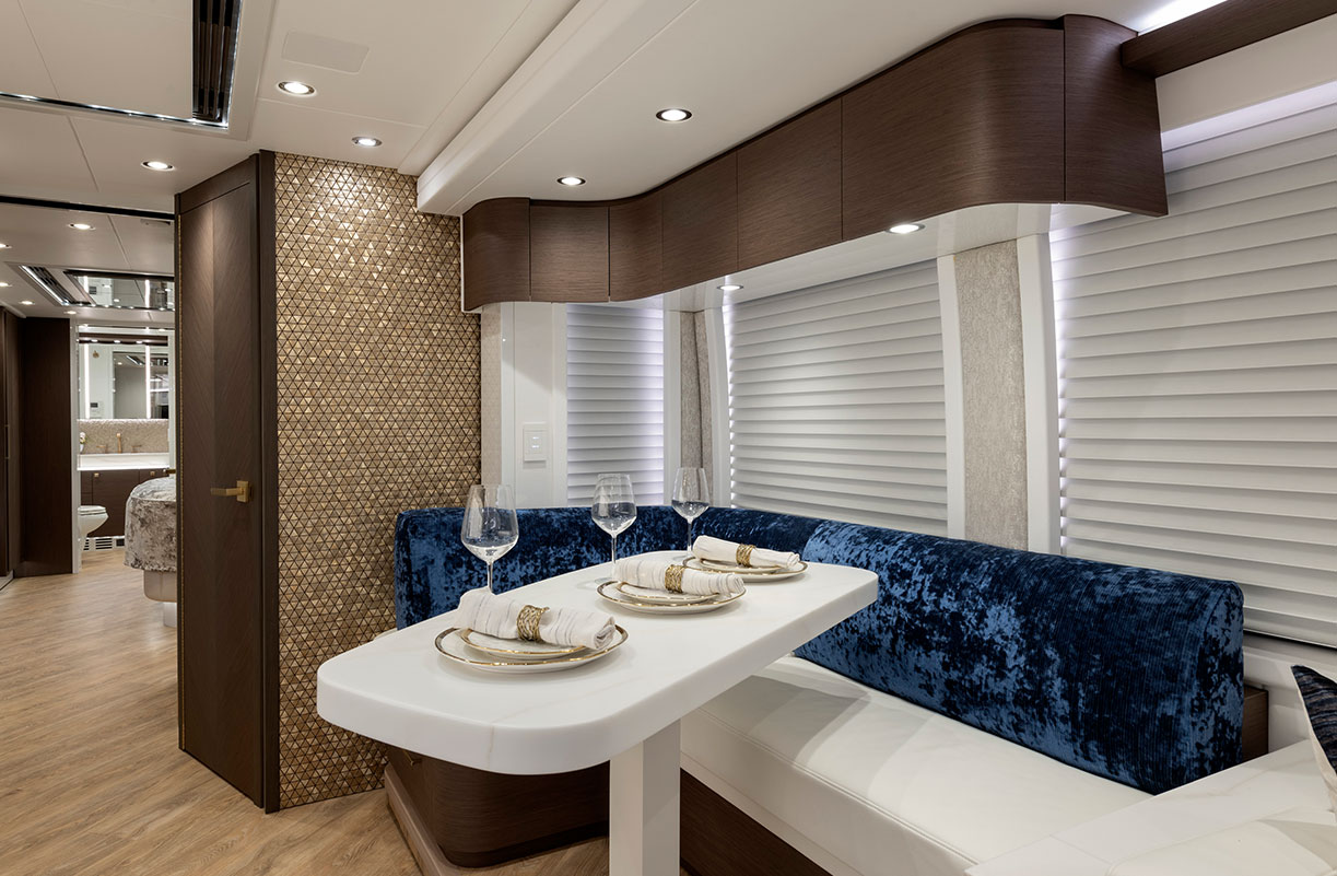 Liberty-Coach-908-Tech-Dining-Main - Custom Luxury Motorcoach